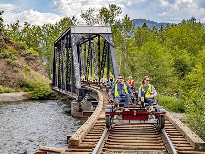 Rail biking across historic trestles, where pedal power meets panoramic views and nobody's worried about traffic jams.