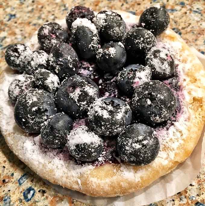 Fresh blueberries piled high on buttery pastry, because sometimes more is actually more and that's perfectly fine.