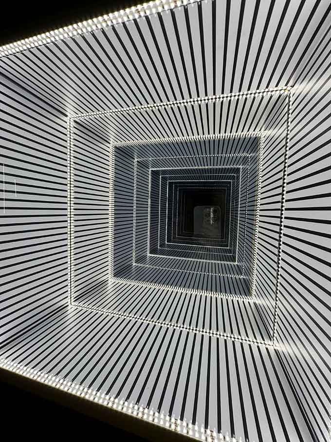 This tunnel goes on forever, or maybe just ten feet, your eyes genuinely can't tell the difference anymore.