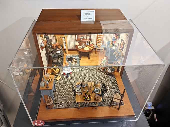 Two complete miniature rooms stacked like the world's fanciest bento box, each one meticulously furnished and lit.