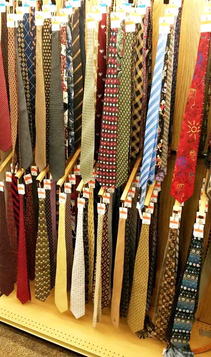 Decades of fashion history hang here, from power lunch patterns to quirky prints that someone definitely wore with confidence.