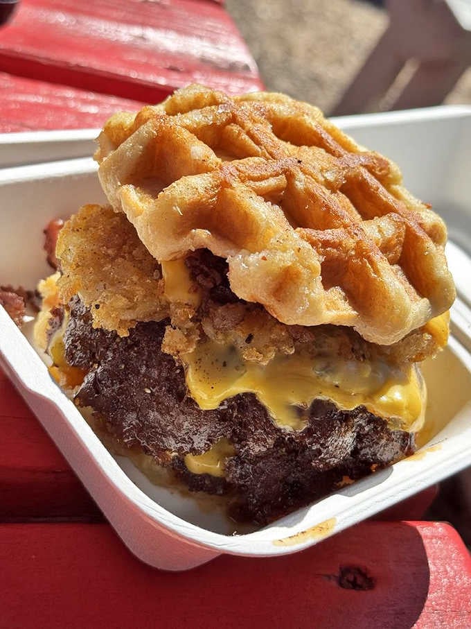 That waffle bun situation is next-level thinking. Someone deserves a medal for this creative burger engineering.