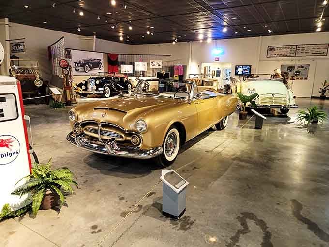 Golden convertible perfection that makes modern luxury cars look like they're not even trying.