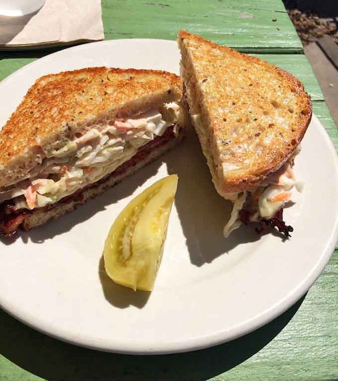 The Manhattan stacks pastrami high on toasted bread, proving this deli knows its way around traditional favorites.