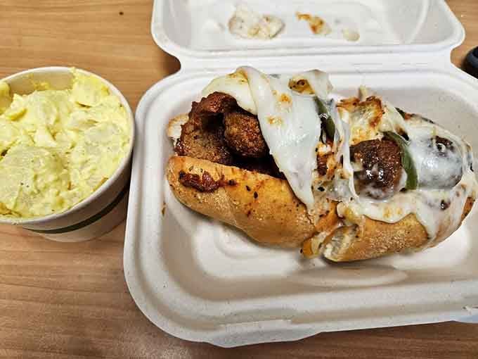 Golden meatballs nestled in a toasted roll with melted cheese create the kind of comfort food that fixes bad days instantly.