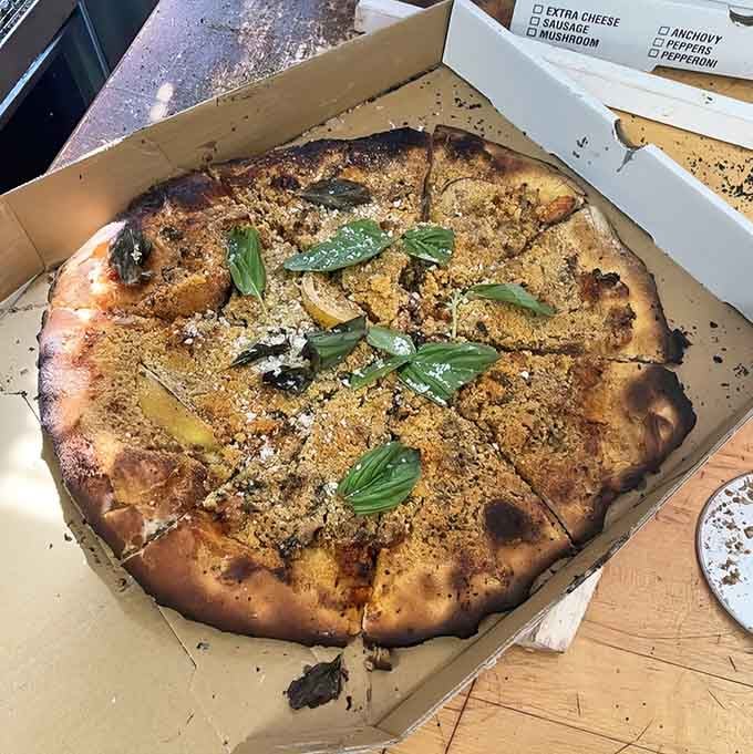 A lobster pizza that answers the question: what if New England and Italy had a delicious baby?