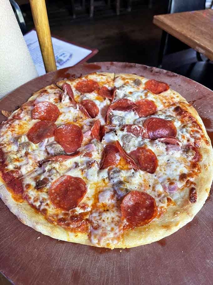 The Meathead Pizza doesn't apologize for its name or its generous toppings, delivering exactly what carnivores crave most.