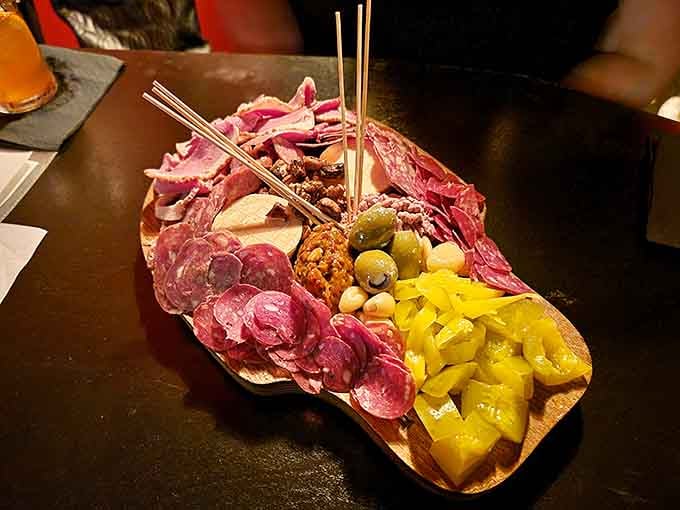 This charcuterie board is served on wood and loaded with enough meats to feed your entire party.