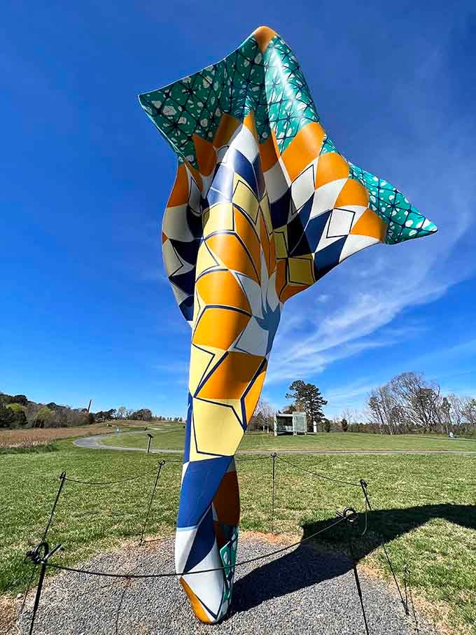 This colorful twisted sculpture reaches for the sky with the kind of optimism we could all use more of.