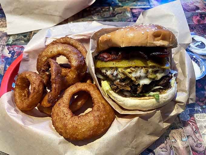 Loaded with bacon and stacked impossibly high, this beast requires both hands and possibly a structural engineer.