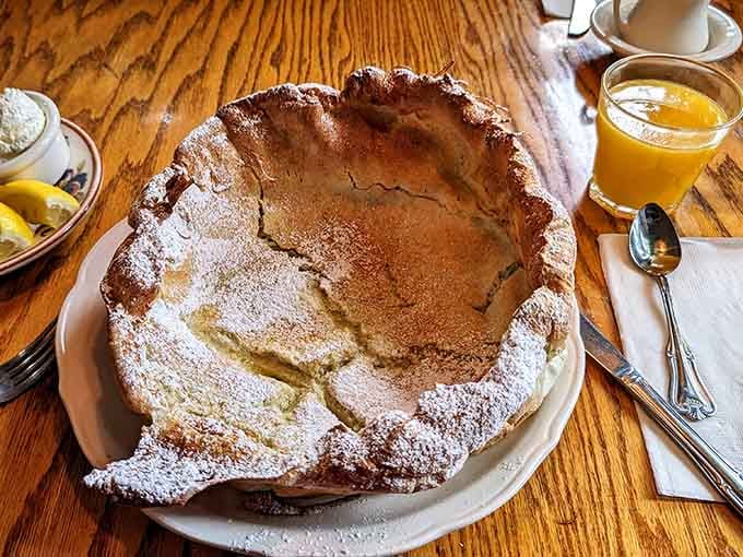 The Dutch baby pancake arrives like a golden souffl&eacute; that decided breakfast needed more drama and less restraint.