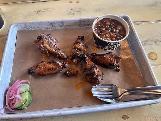 Buffalo wings with that perfect char prove that even the supporting cast deserves a standing ovation here.