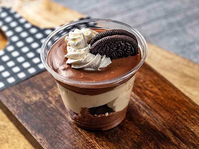 Oreo parfait layered with chocolate mousse proving that some international collaborations are absolutely worth celebrating with multiple servings.
