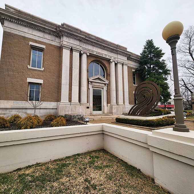 Classical columns and modern sculpture prove that culture and affordability can coexist beautifully in western Kentucky's gem.
