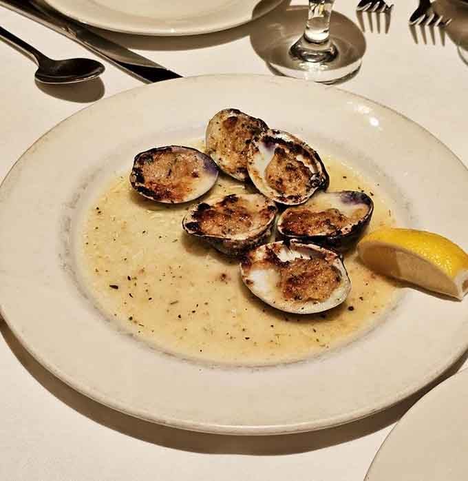 Perfectly broiled clams in a butter sauce that deserves its own standing ovation and encore performance.
