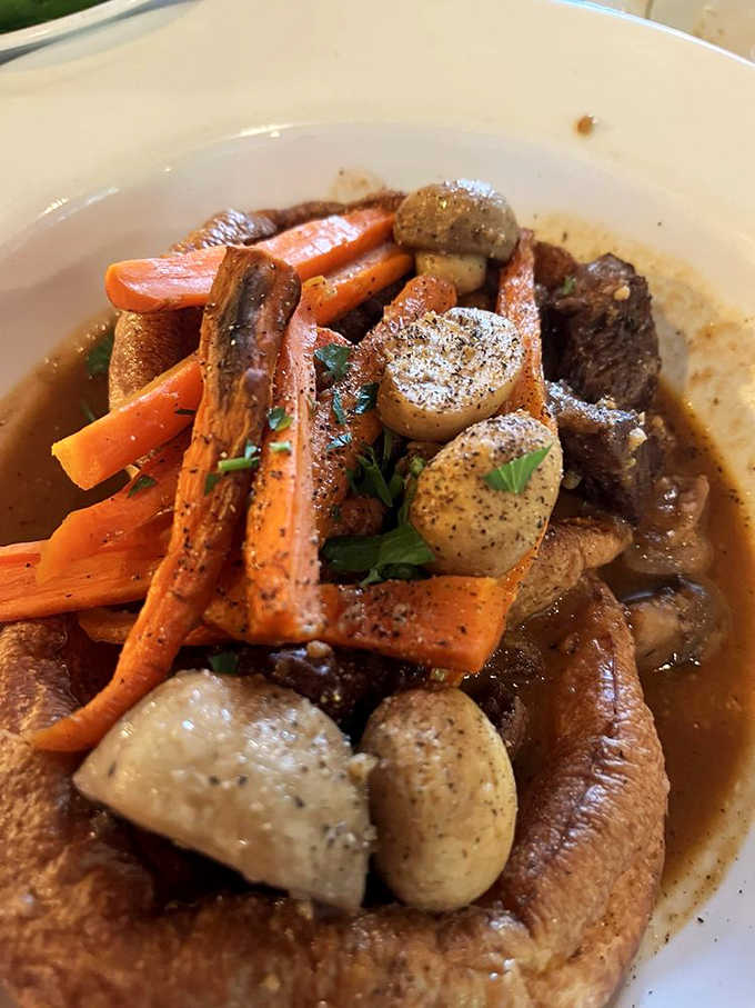 Roasted carrots, tender potatoes, and savory meat in rich gravy prove British comfort food deserves more respect.