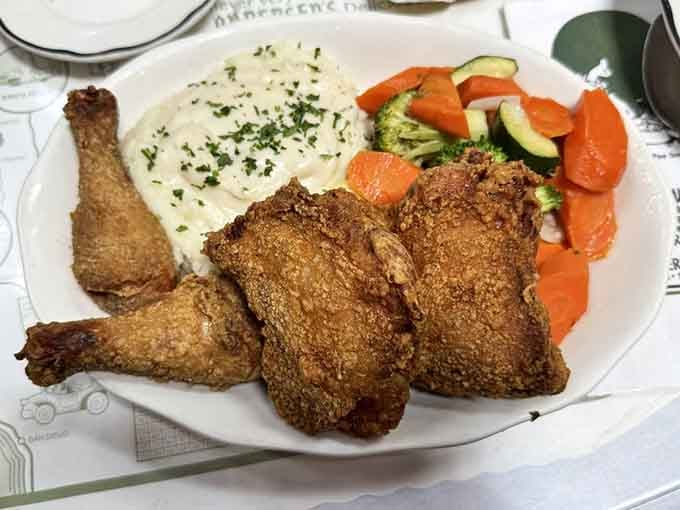 Homestyle fried chicken with vegetables and mashed potatoes, because sometimes you need more than just soup for the road.