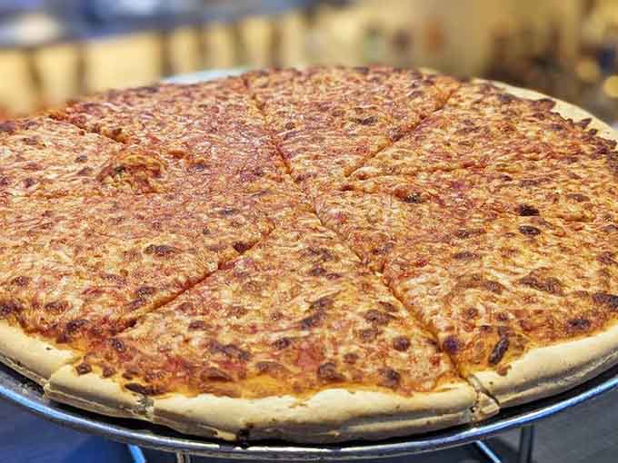 The plain pie proves you don't need fancy toppings when your crust achieves this level of golden perfection.