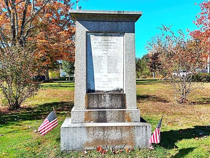 Small towns remember their heroes in granite and flags, keeping history alive one name at a time.