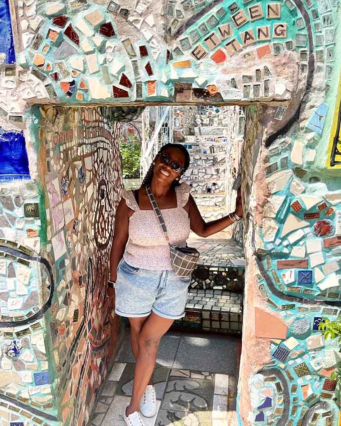 Standing beneath that mosaic archway, visitors become part of the artwork themselves, framed by decades of creative vision.