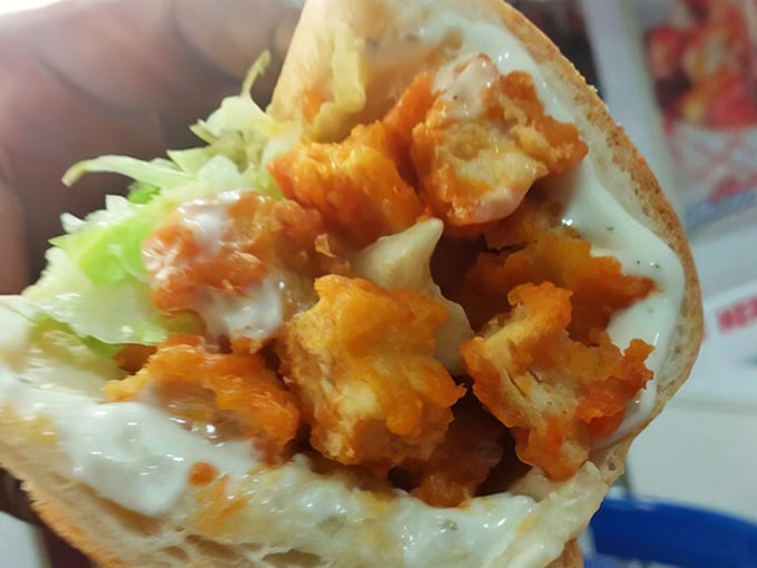 Buffalo chicken meets cheesesteak in this glorious mashup that proves sometimes fusion food absolutely works when done right.