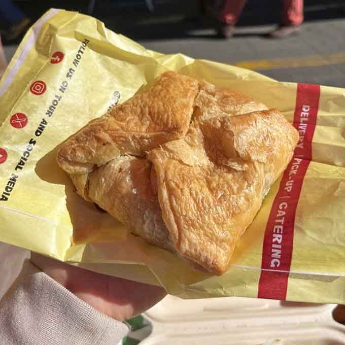 That flaky, buttery exterior cradles savory filling like a delicious sleeping bag you actually want to eat for breakfast or lunch.
