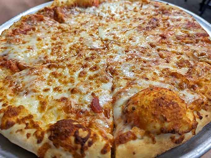 Pure cheese pizza perfection that needs no toppings to justify its existence or win over your taste buds completely.