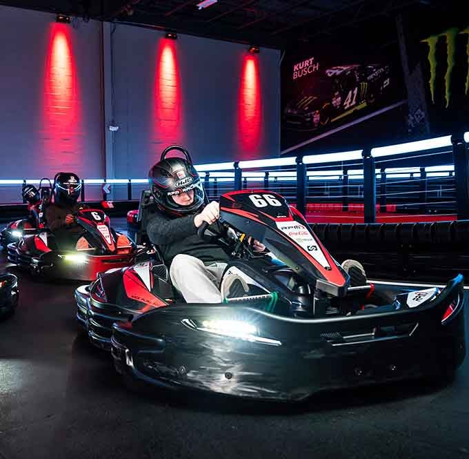 The lighting transforms racing into something between a nightclub and your childhood dreams of going fast.