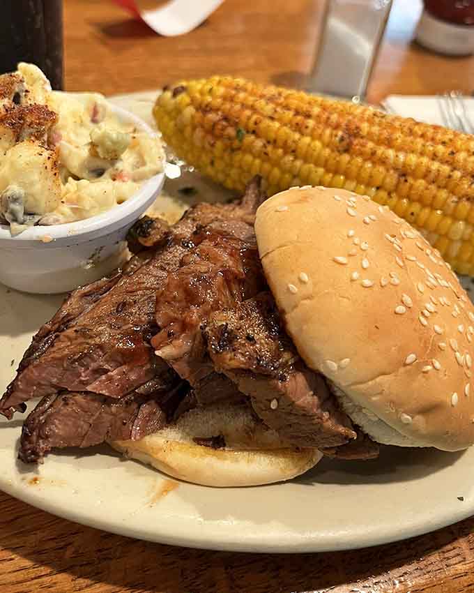 Brisket sandwich with corn on the cob, because sometimes you need vegetables to feel better about your choices.