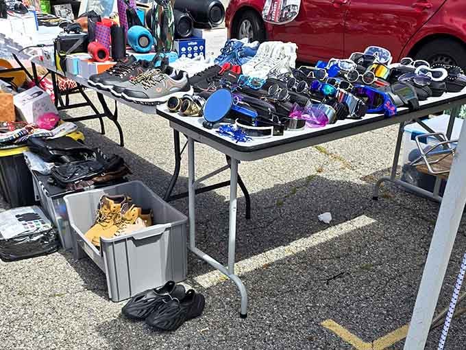 Sunglasses spread across tables like a rainbow, because protecting your eyes shouldn't cost a fortune.