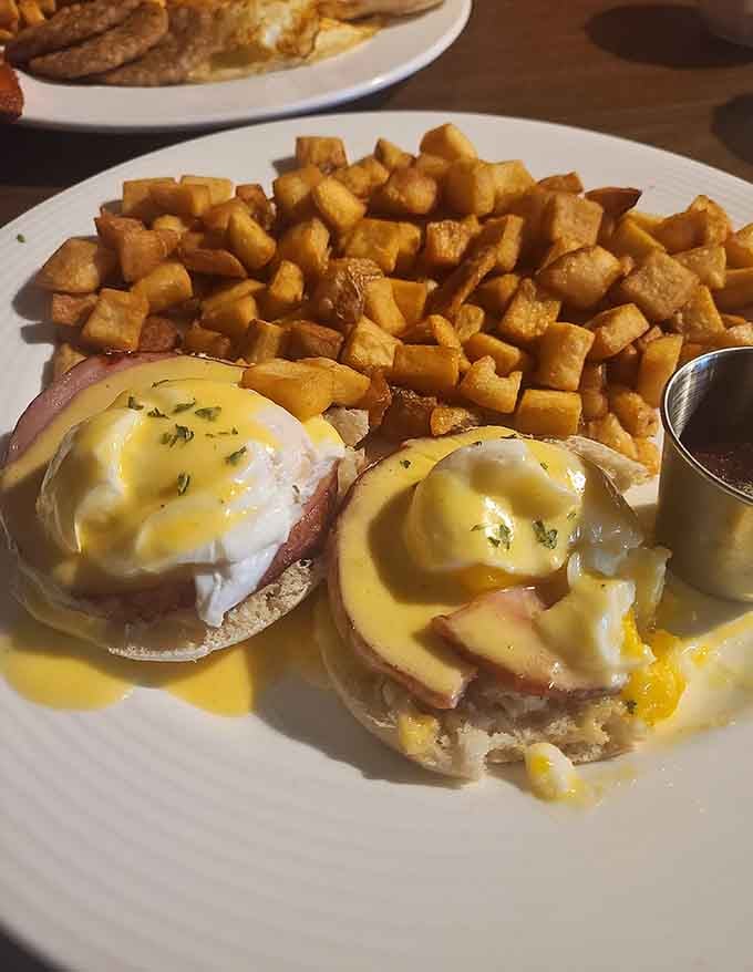 Eggs Benedict with hollandaise so perfectly draped it deserves its own Instagram account, honestly.