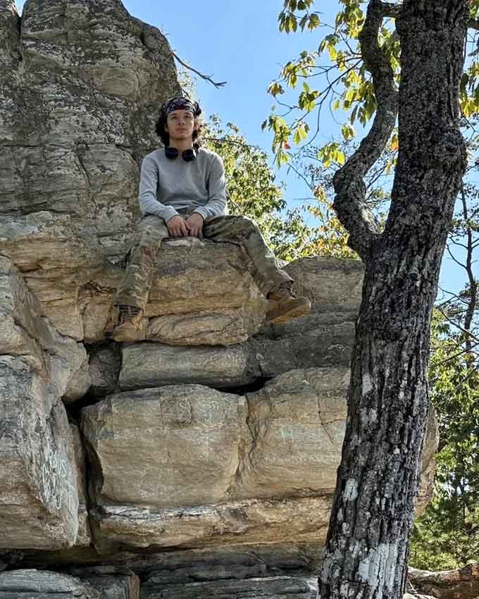 These massive rock formations are perfect for taking a break and soaking in the peaceful forest views all around you.
