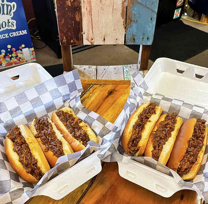 Specialty hot dogs lined up like edible works of art, each one topped with enough chili to make your taste buds sing.