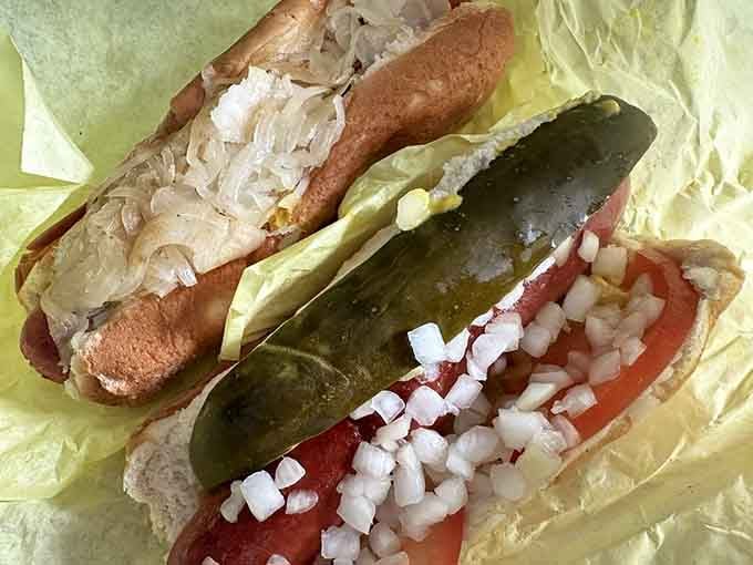 Look at this magnificent duo: a super dog and a kraut dog proving that sauerkraut belongs on everything delicious.