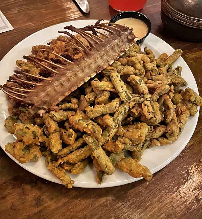 Fried green beans and prime rib bones create a combination that defies logic but delivers pure satisfaction.