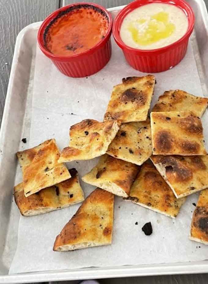 Pizza chips with dipping sauce turn leftover dough into crispy, addictive bites of pure genius.