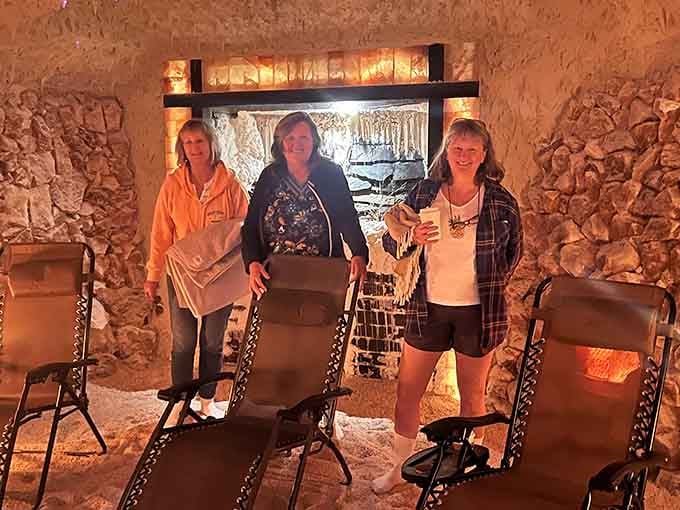 Three friends discovering that the best girls' night out involves doing absolutely nothing together in a salt cave.