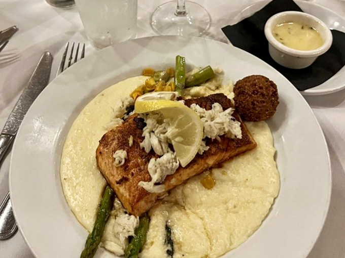 Fresh salmon topped with lump crab is the kind of surf-and-surf combination that makes choosing between seafood options obsolete.