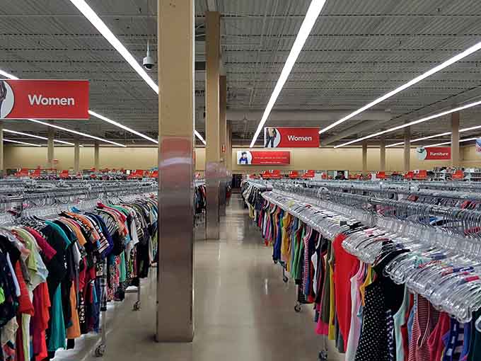 Endless racks of women's clothing stretch into the distance like a fabric rainbow that never quite reaches its end.