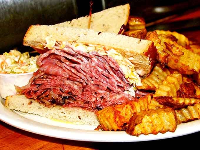 Pastrami stacked so high it makes you question everything you thought you knew about portion control.