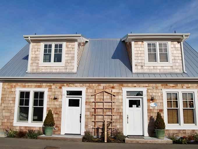 Cedar shingles and white trim create that timeless coastal look that never gets old, just better with age.