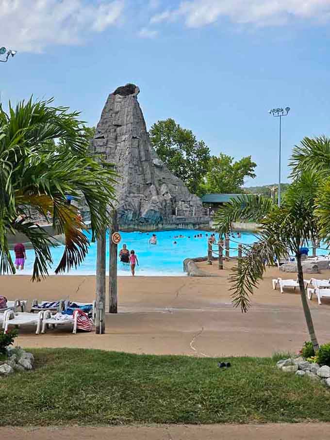 The wave pool's volcano centerpiece adds dramatic flair to your aquatic adventures, because why settle for ordinary when you can have theatrical?