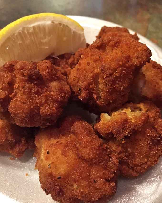 Golden-fried gator nuggets with a squeeze of lemon prove that adventure tastes absolutely delicious when done this well.