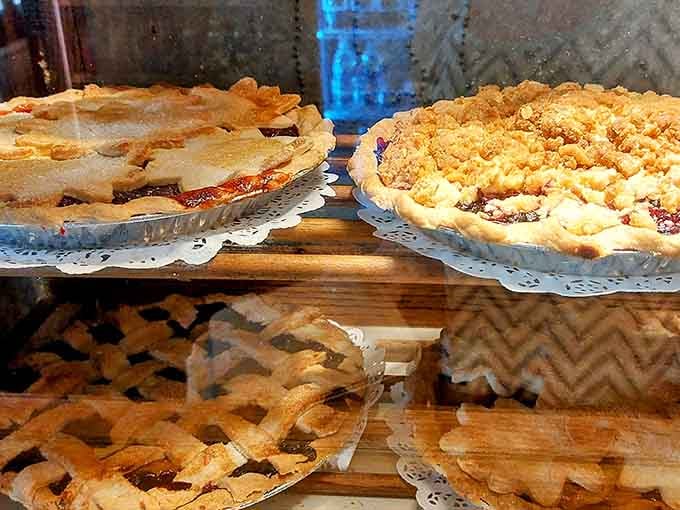 Homemade pies lined up like edible works of art, each one begging you to reconsider your breakfast order.