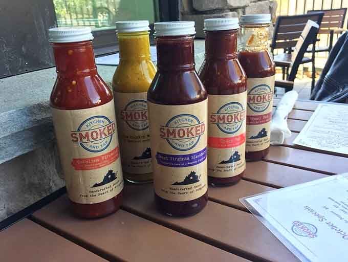 House-made sauces lined up like soldiers, each one ready to add its own personality to your plate.