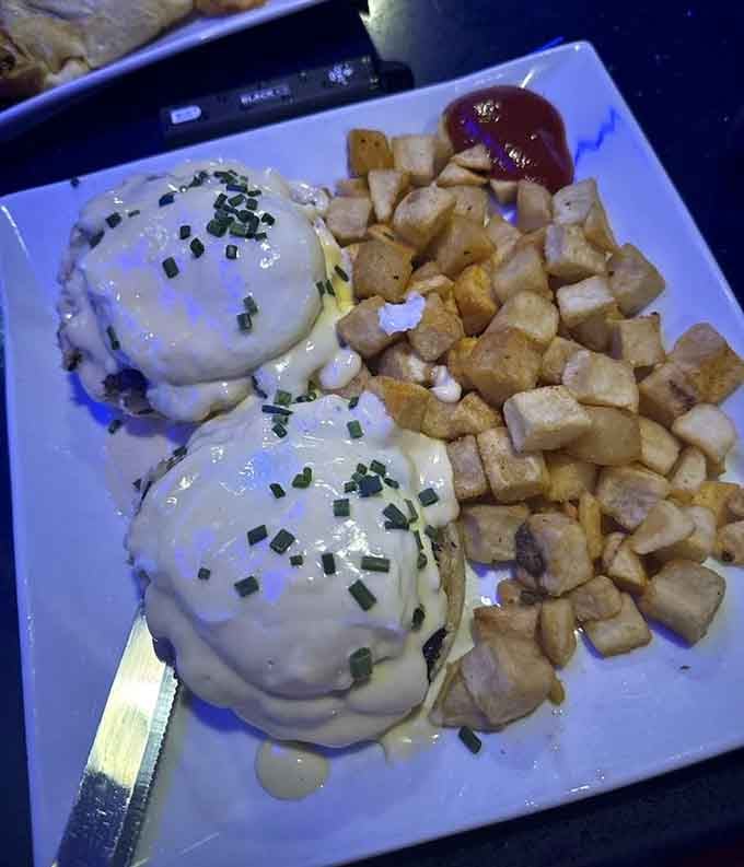 Crab cake Benedict with hollandaise that flows like liquid gold, turning breakfast into a treasure hunt for your taste buds.