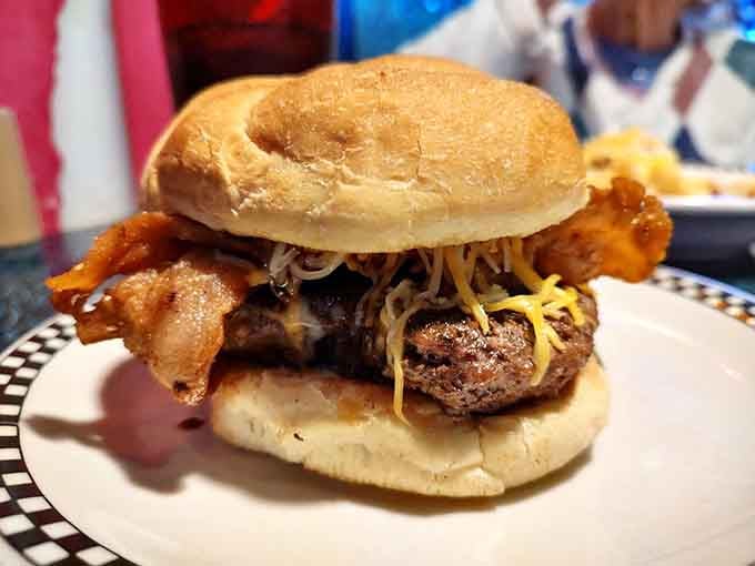 The Cherry Bourbon burger arrives looking like it means business, with bacon doing what bacon does best.