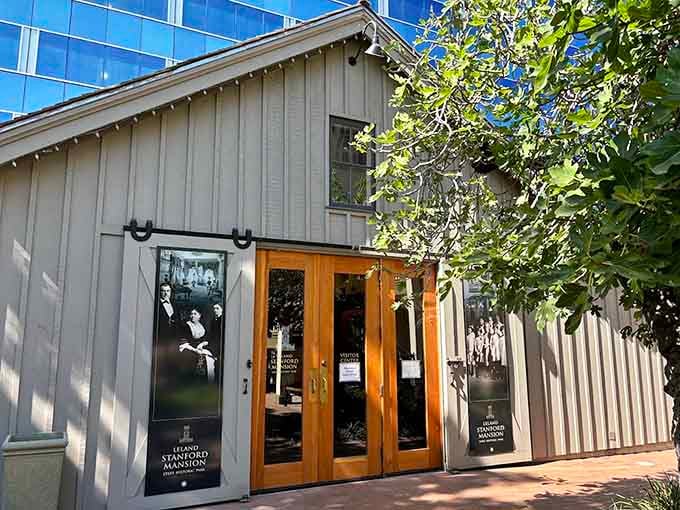 The modern entrance building proves you can blend contemporary design with historical surroundings without causing architectural chaos.