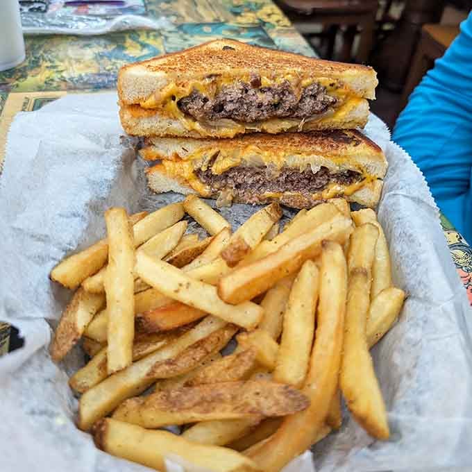 A patty melt situation that's grilled to perfection, proving heroes appreciate the classics done right too.