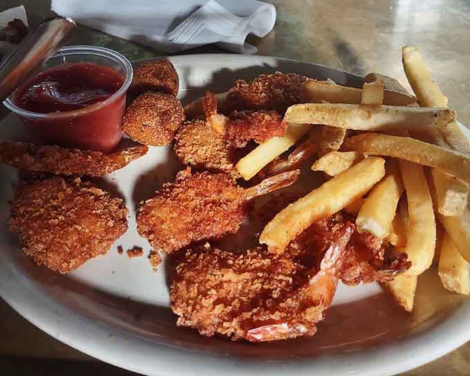 Golden fried shrimp paired with crispy fries proves that sometimes the classics don't need reinventing, just proper execution and love.